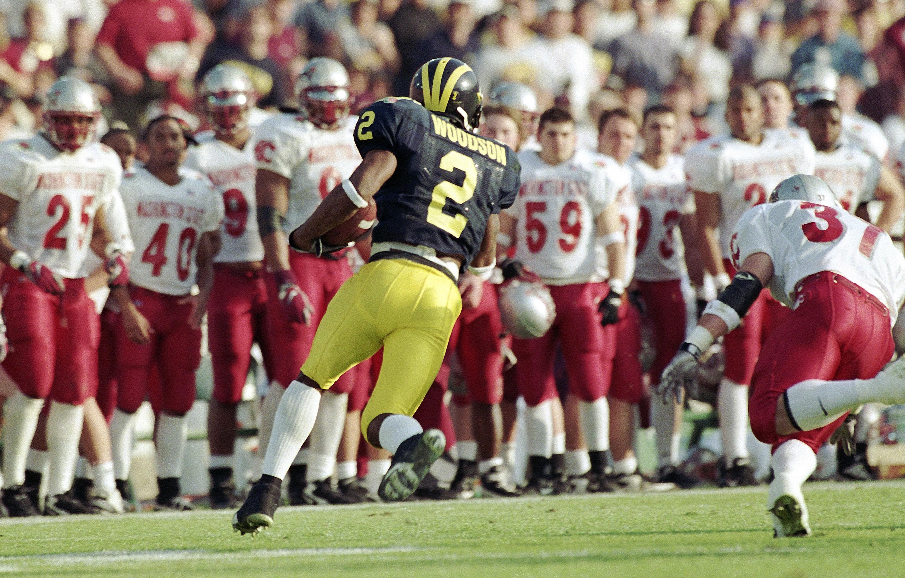 Who are the top father/son duos to play football at Michigan?