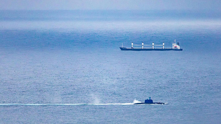 The US Navy is now quietly guiding tankers through the Strait of Hormuz ...