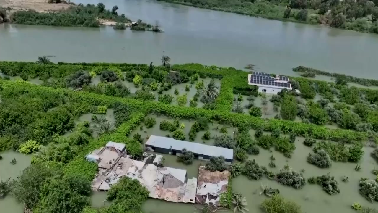 Swelling Euphrates River floods homes and farmland in Syria