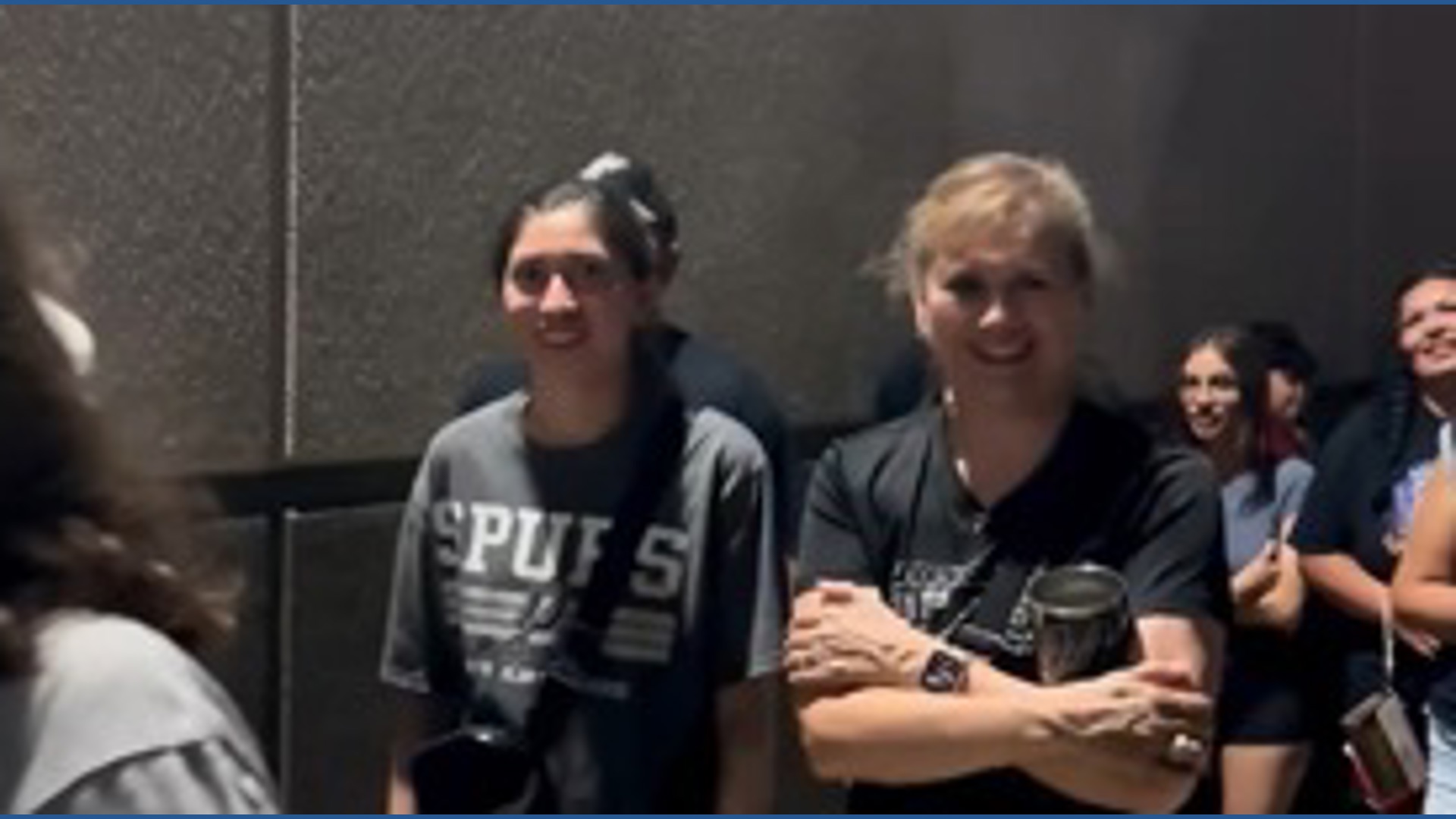 Spurs fans waiting outside Academy Sports