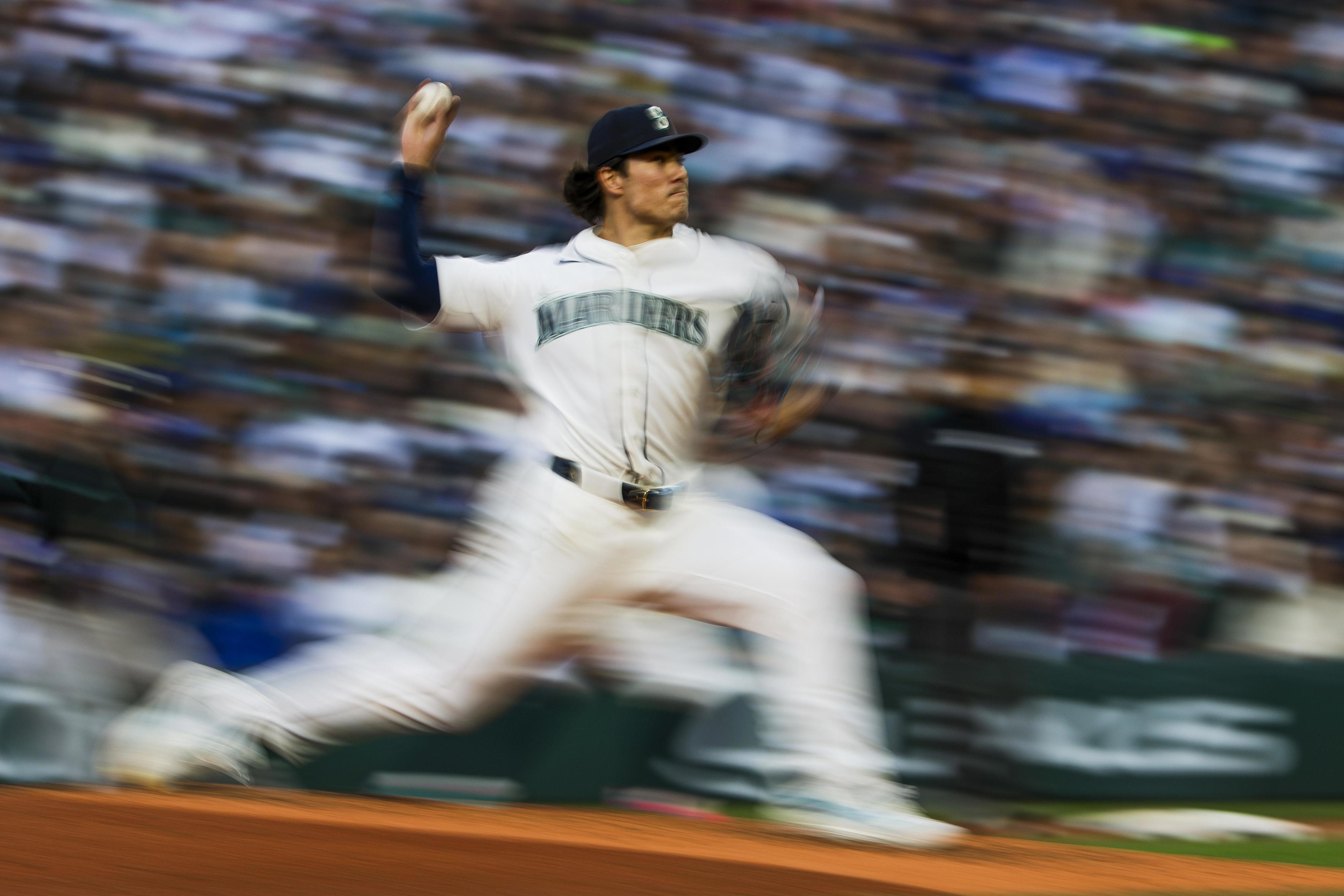 Bryan Woo dazzles, Mariners bash quartet of solo shots to breach .500