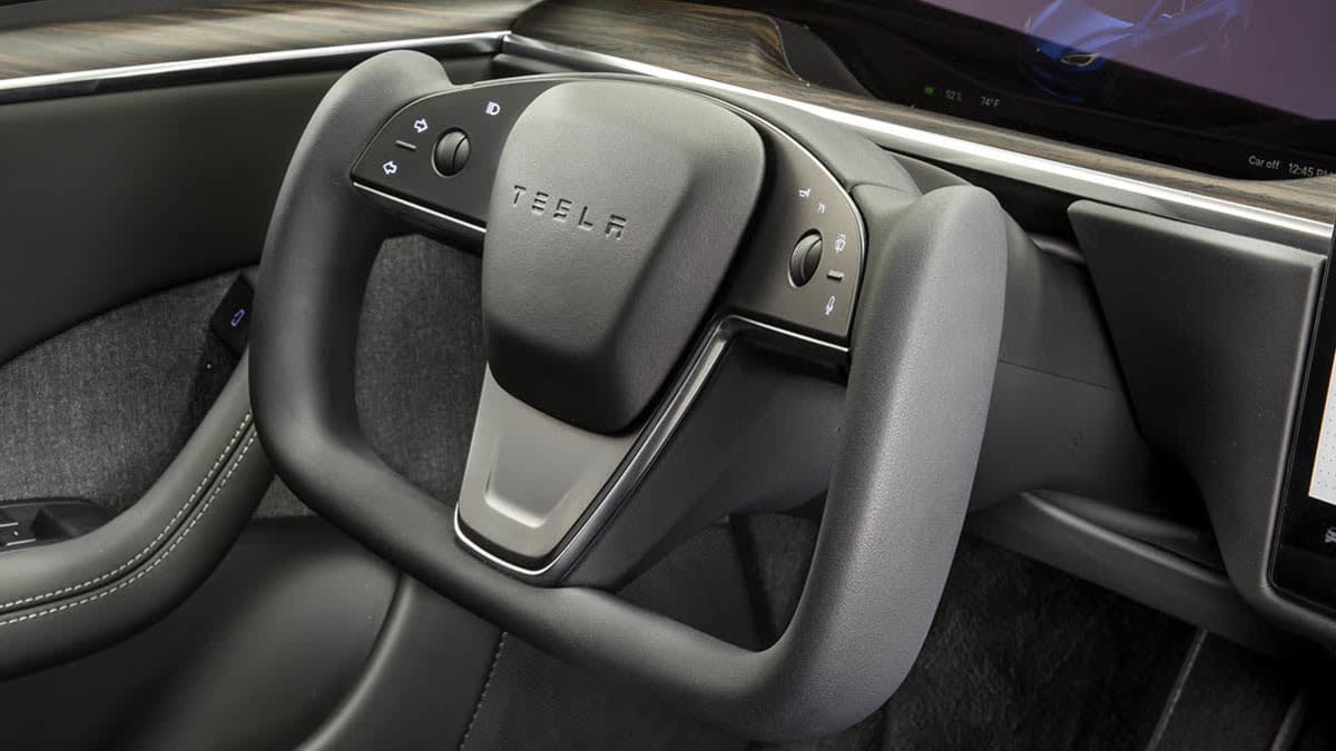 Reclining seats, flush door handles, yoke steering wheels, one-pedal ...