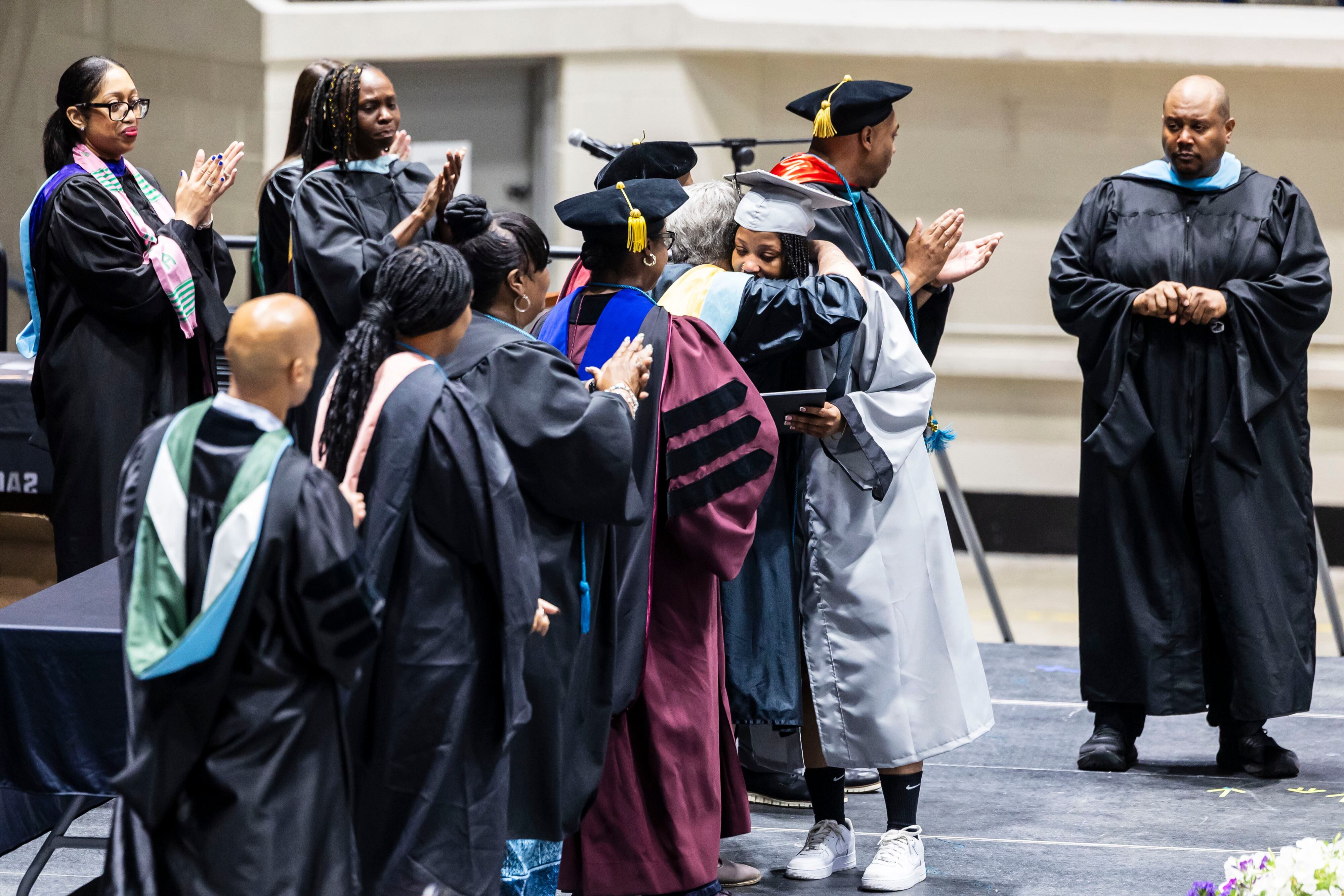 Mother accepts slain son’s diploma at graduation, and other Saginaw ...