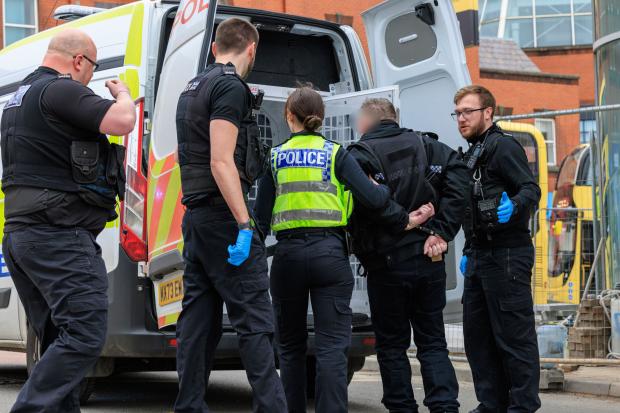 'Particularly demanding day' for police who make hundreds of arrests