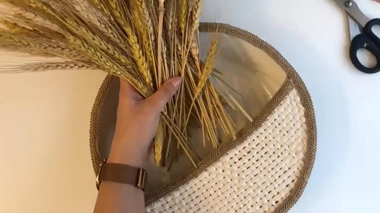 Don't toss an old cooking pan — make an adorable kitchen decor piece