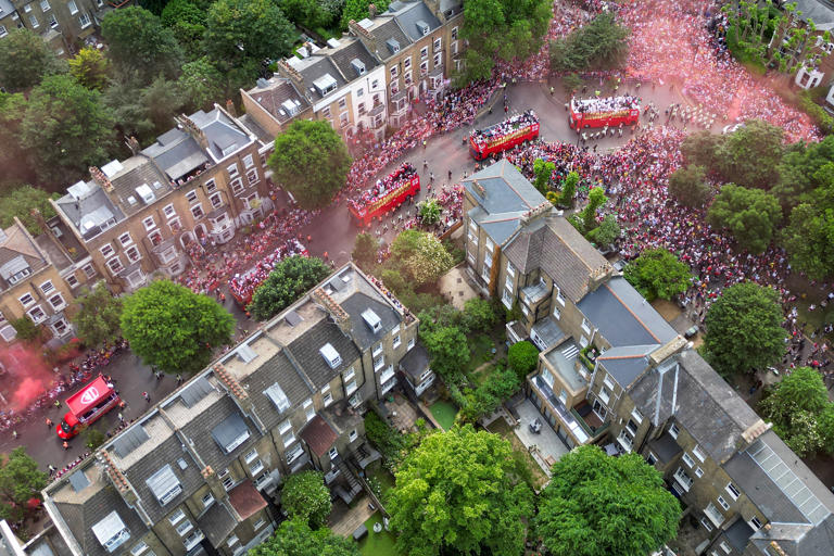 Thousands of Arsenal fans line London streets for trophy parade
