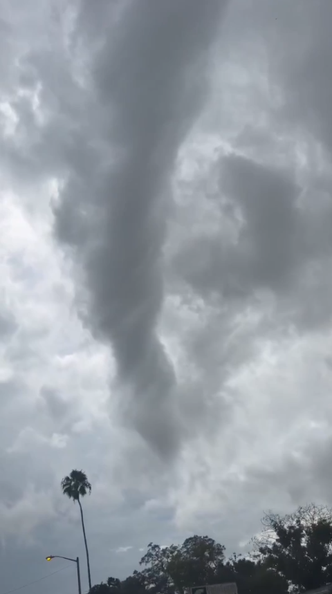 Funnel cloud forms near downtown Melbourne