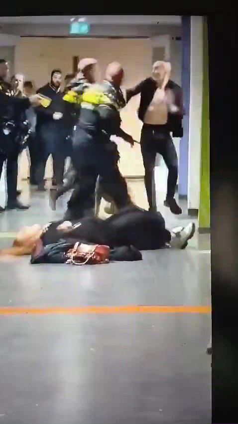 Police grab pregnant woman by the hair and drag her along the floor