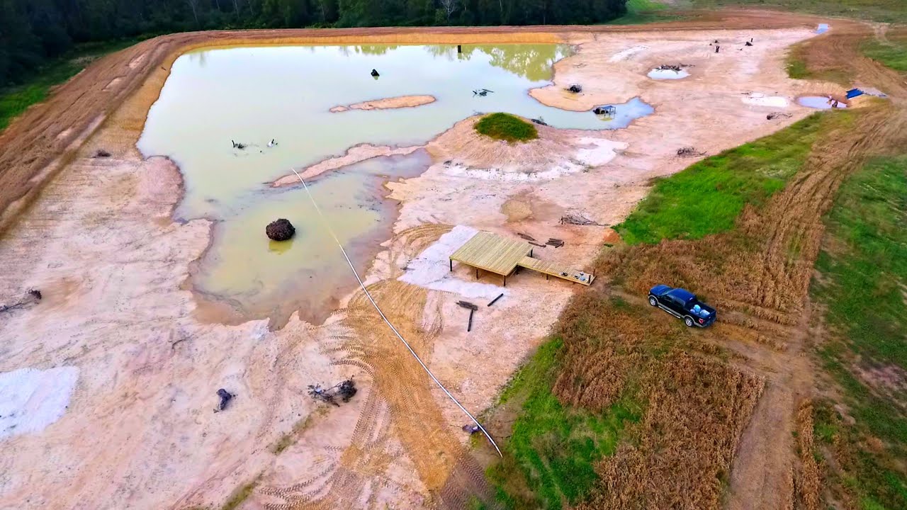 Building a 5 acre pond! (Filling it with water)