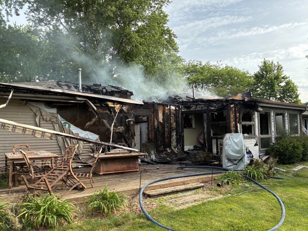 One person escaped as flames spread into the attic of this house near ...
