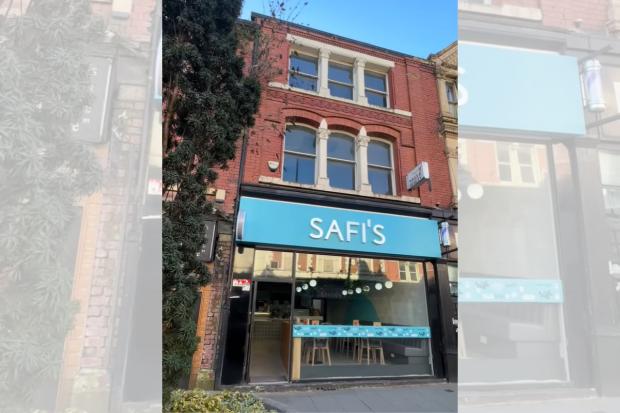 Upper floors of town centre building proposed to be converted to a HMO