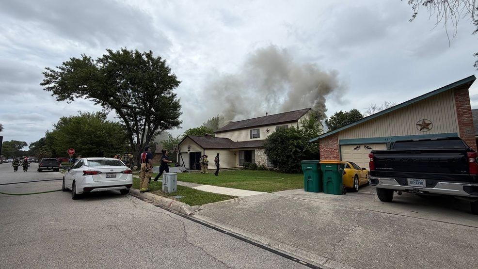 House fire leads to road closure as police, fire contain scene and ...