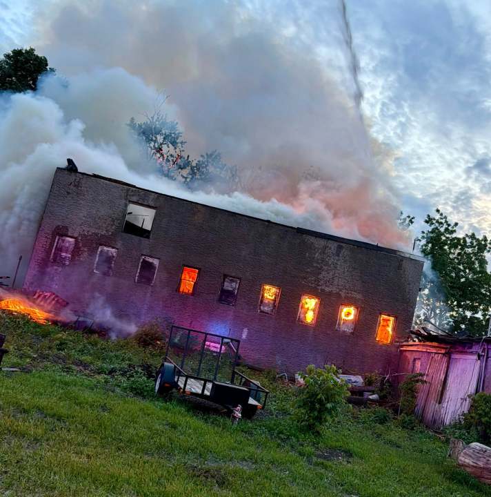 A dozen agencies respond to historic Homer barn fire