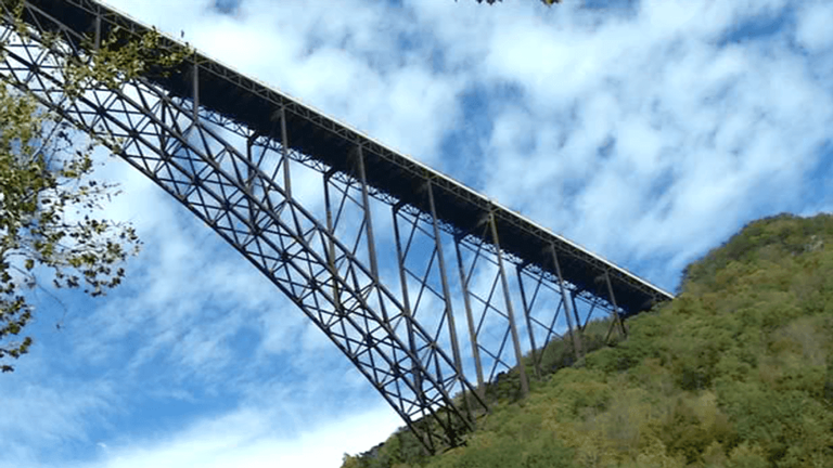 High line rope rescue team extricates injured climber along New River