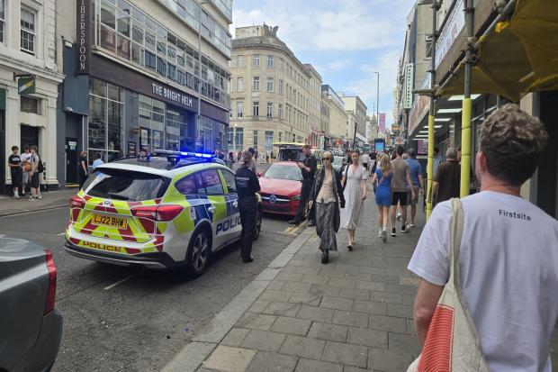 Woman injured in collision between car and bike outside Wetherspoons