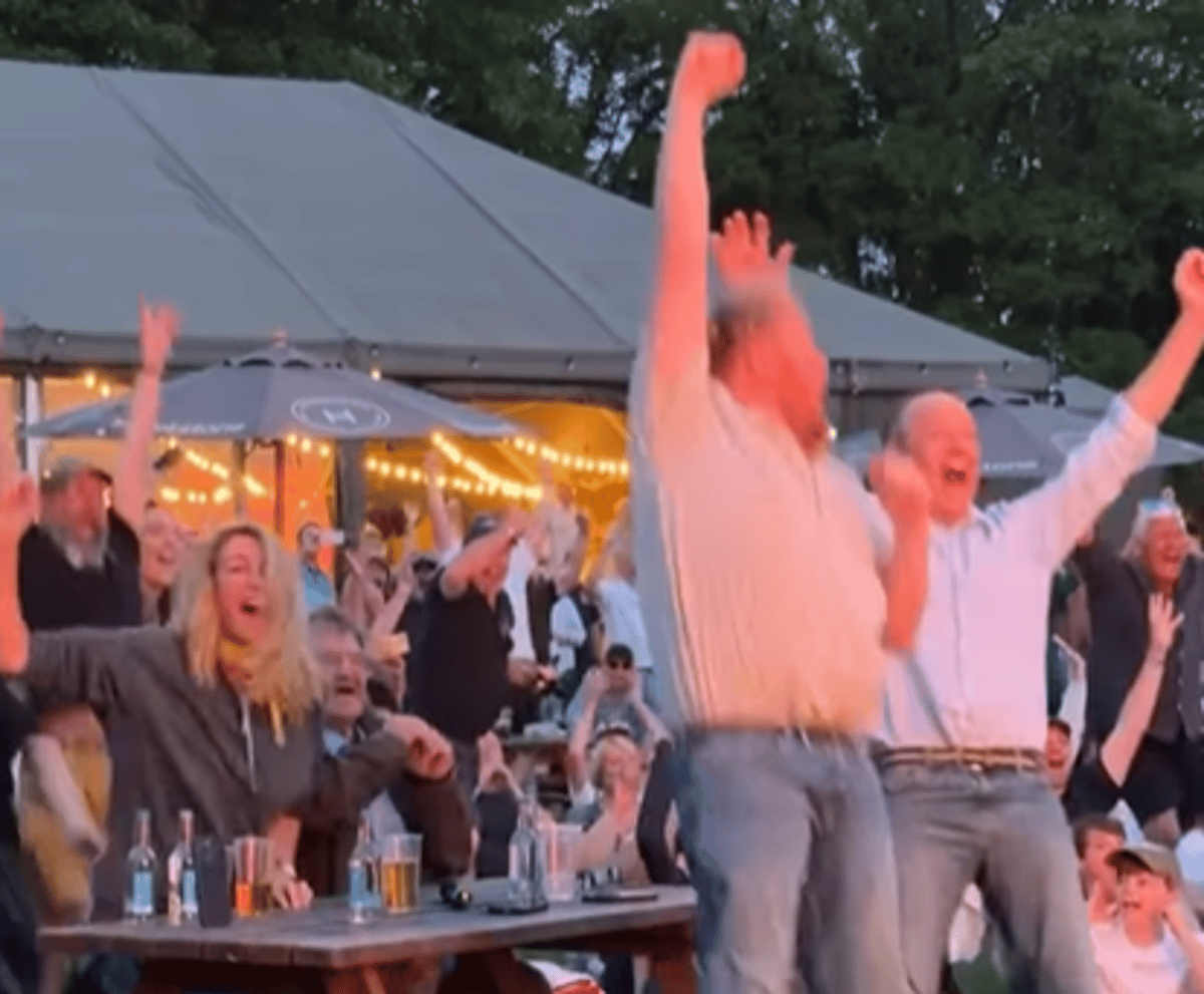 Jeremy Clarkson and Kaleb Cooper celebrate as their choir wins BGT