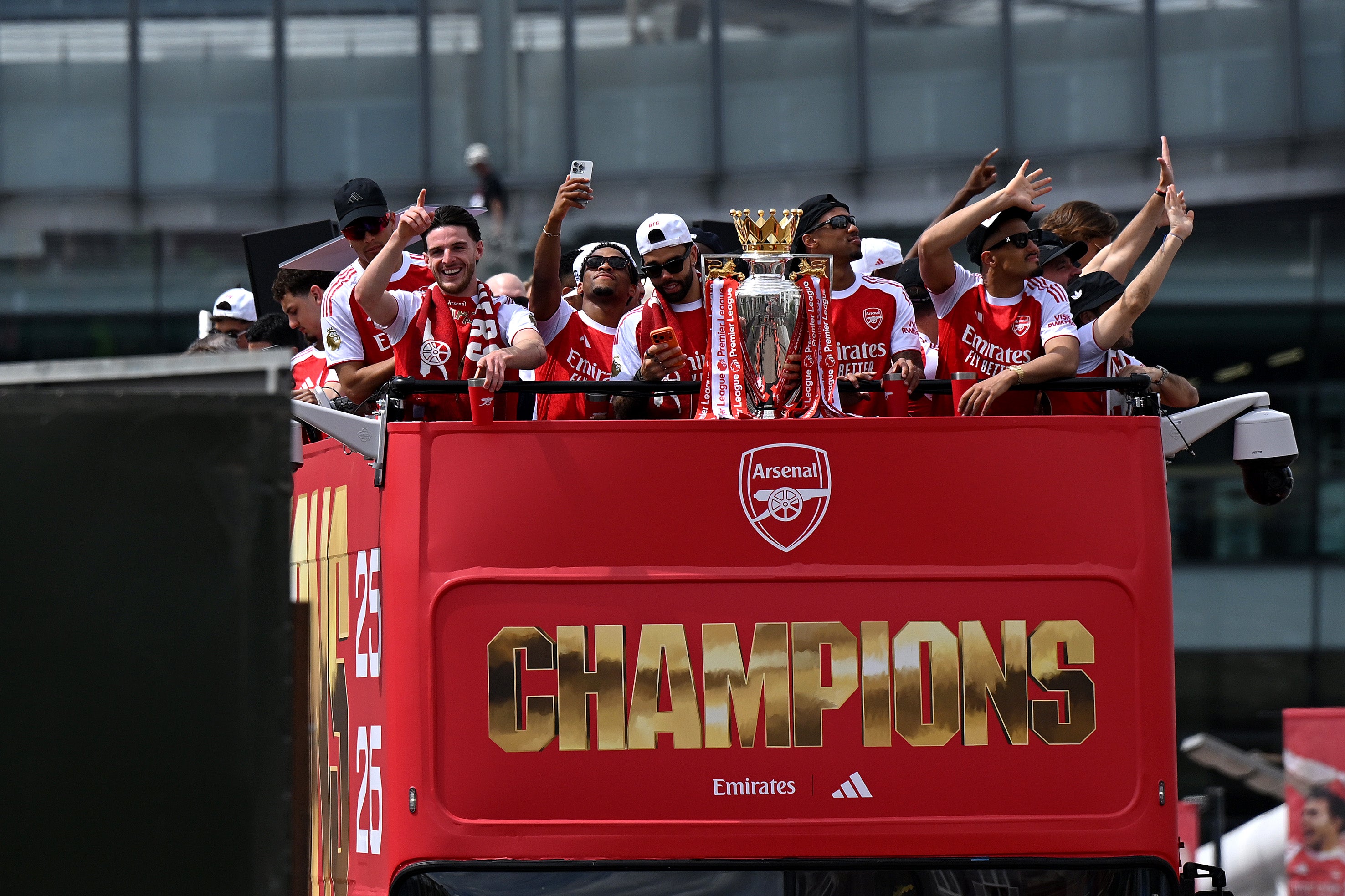 Thousands of Arsenal fans line London streets for trophy parade