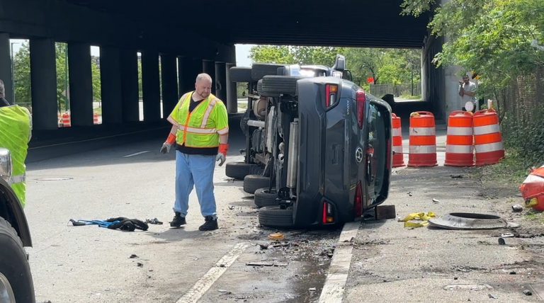Tractor-trailer with 3 cars onboard rolls over on Route 16