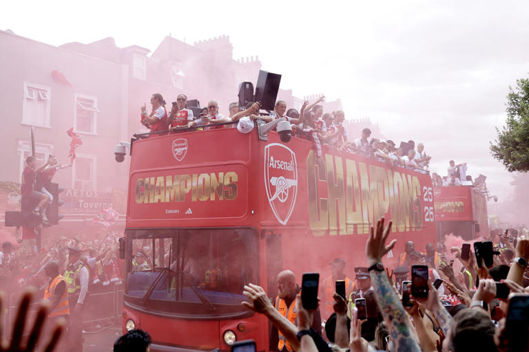 Thousands of Arsenal fans line London streets for trophy parade