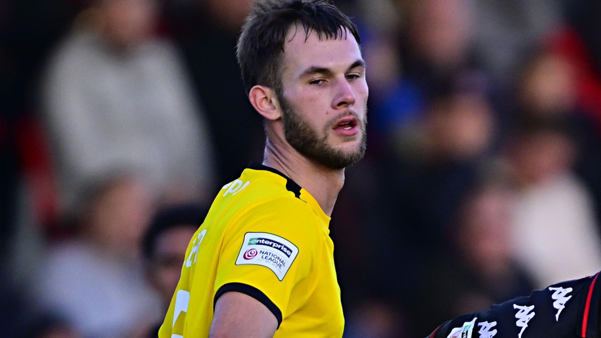 Defender Cooper signs new Altrincham contract
