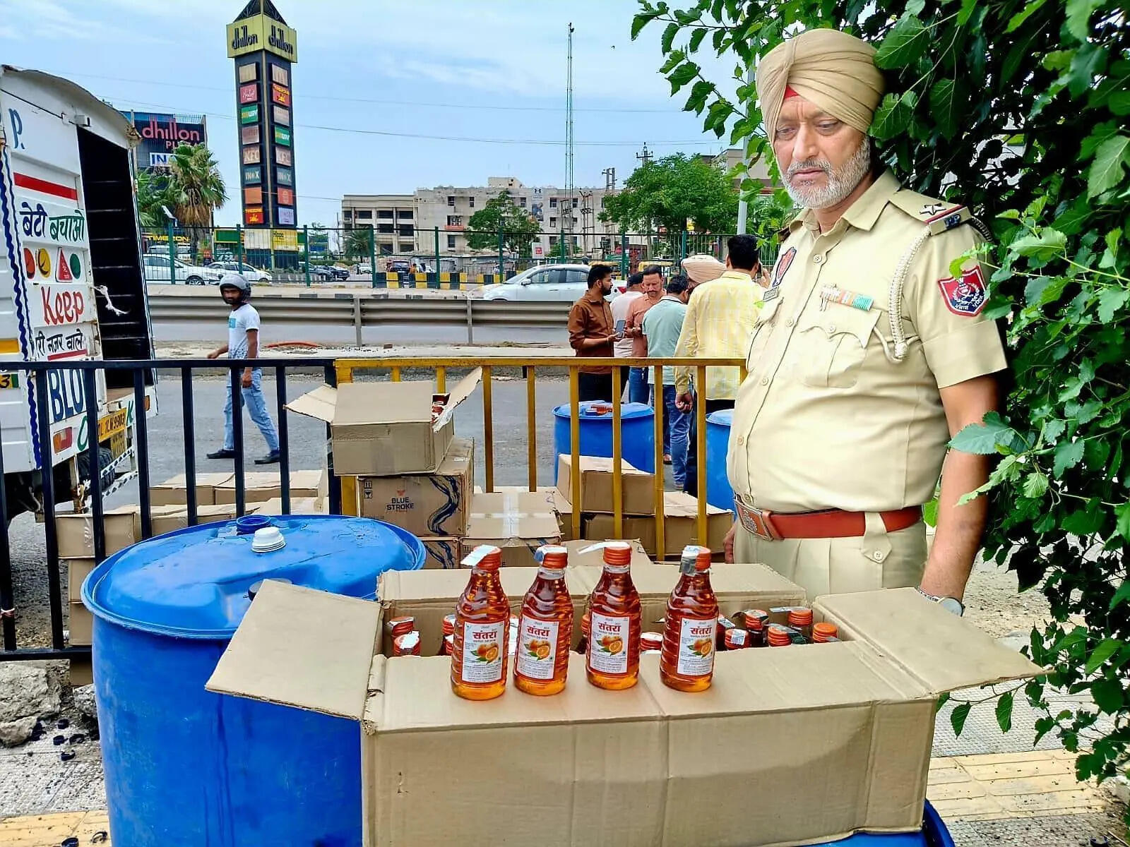 Police bust bootlegging racket, seize 100 illegal liquor cartons