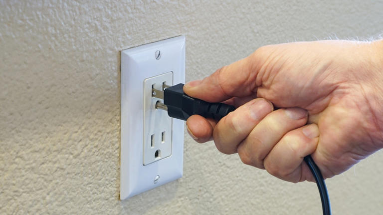 Why is one prong slot on electrical outlets bigger than the other?