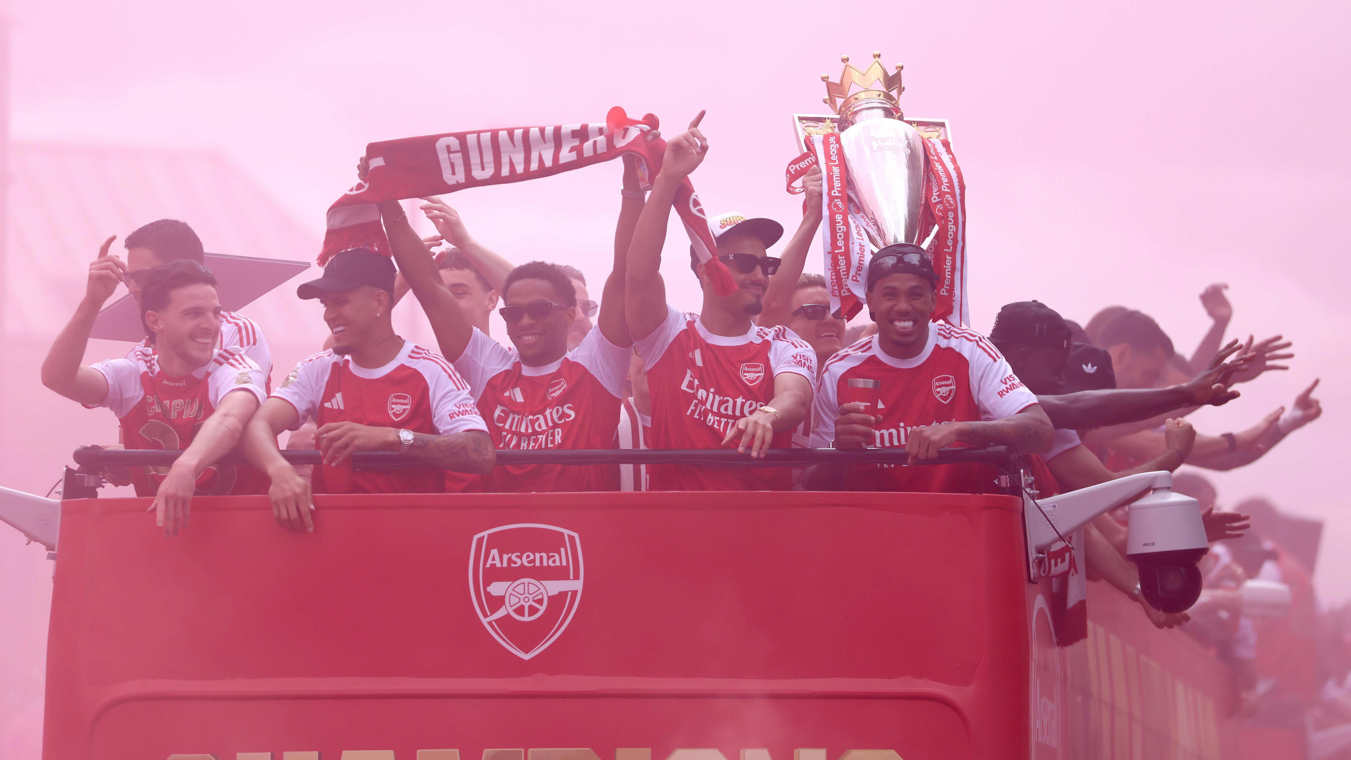 Arsenal fans turn streets red for victory parade