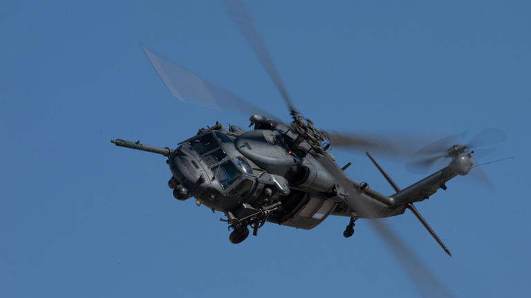 Why do some military helicopters have a pole on the front?