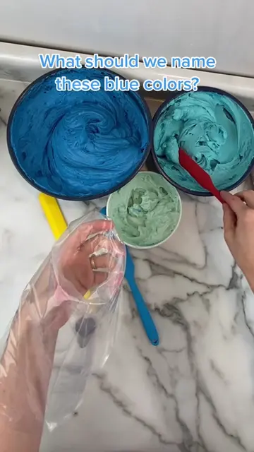 Mixing dreamy blue frosting shades for a sheet cake glow
