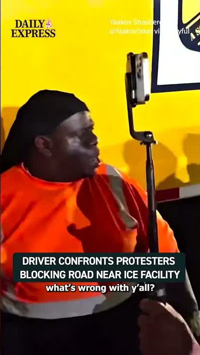 Driver clashes with protesters blocking road near ICE facility