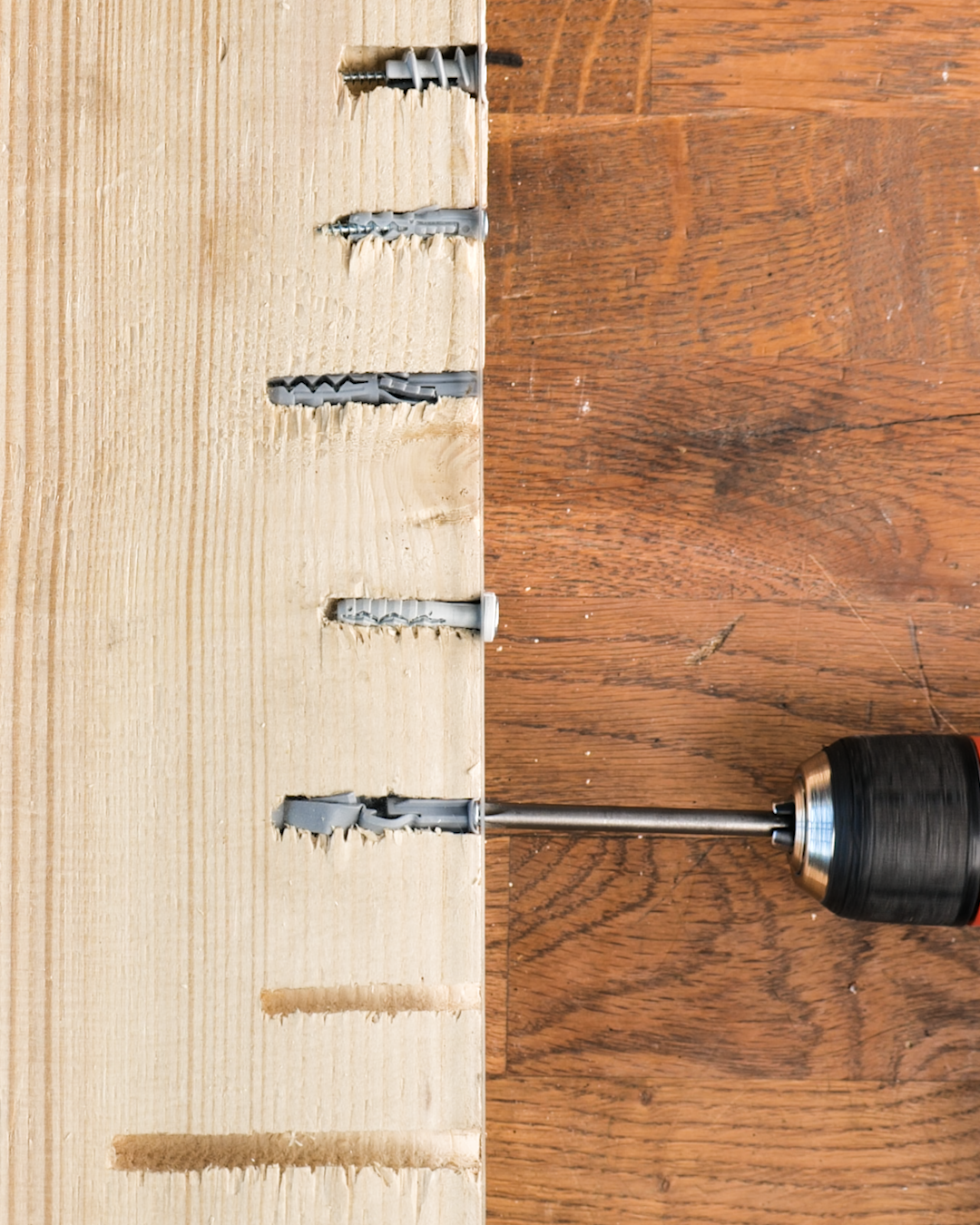 Using drywall anchors in solid walls
