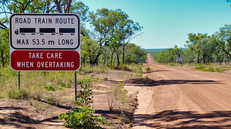 Australia's longest road trains dwarf American semi trucks (but they'd ...