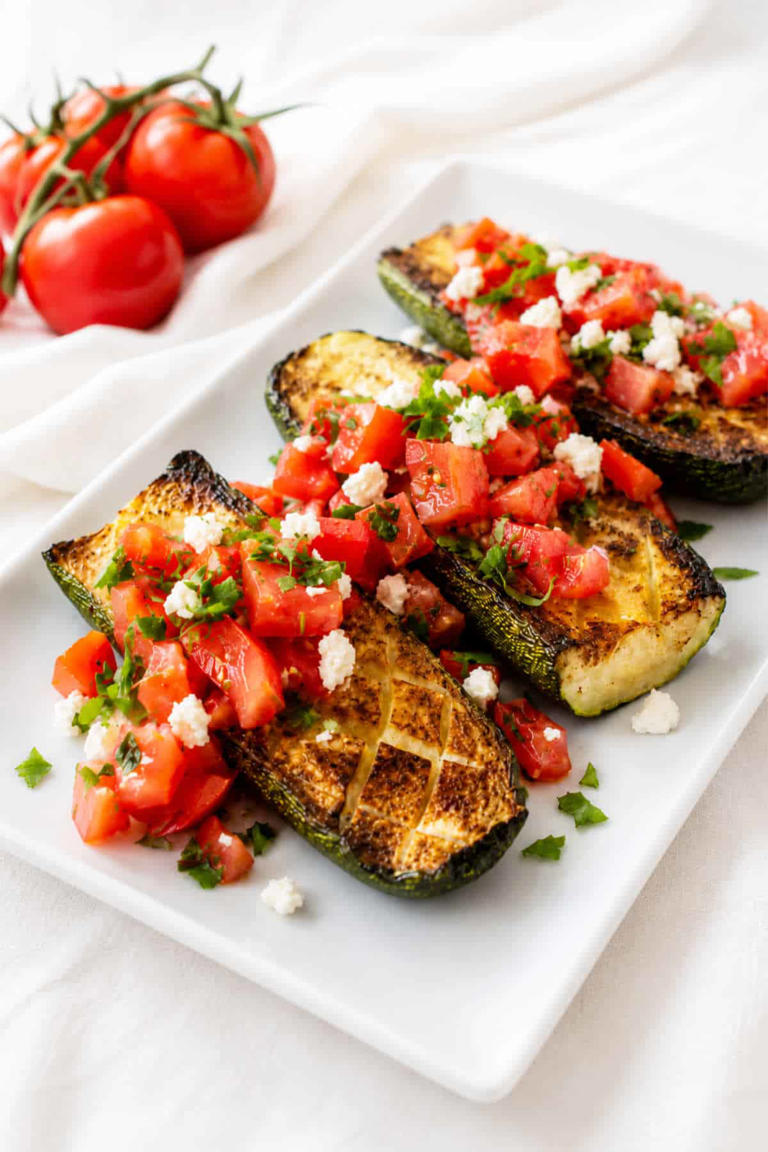Baked zucchini with tomatoes and feta