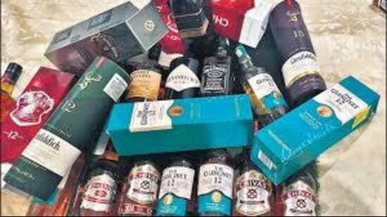 Cops seize 21 cartons of illicit liquor from garment unit in Ludhiana