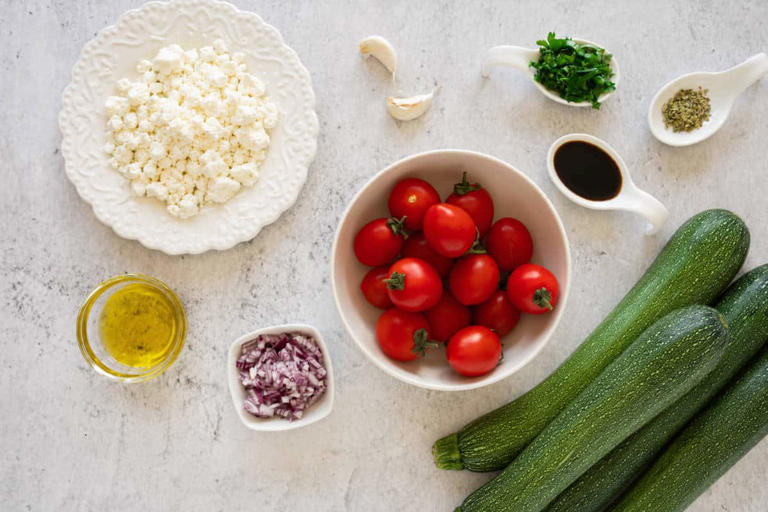 Baked zucchini with tomatoes and feta