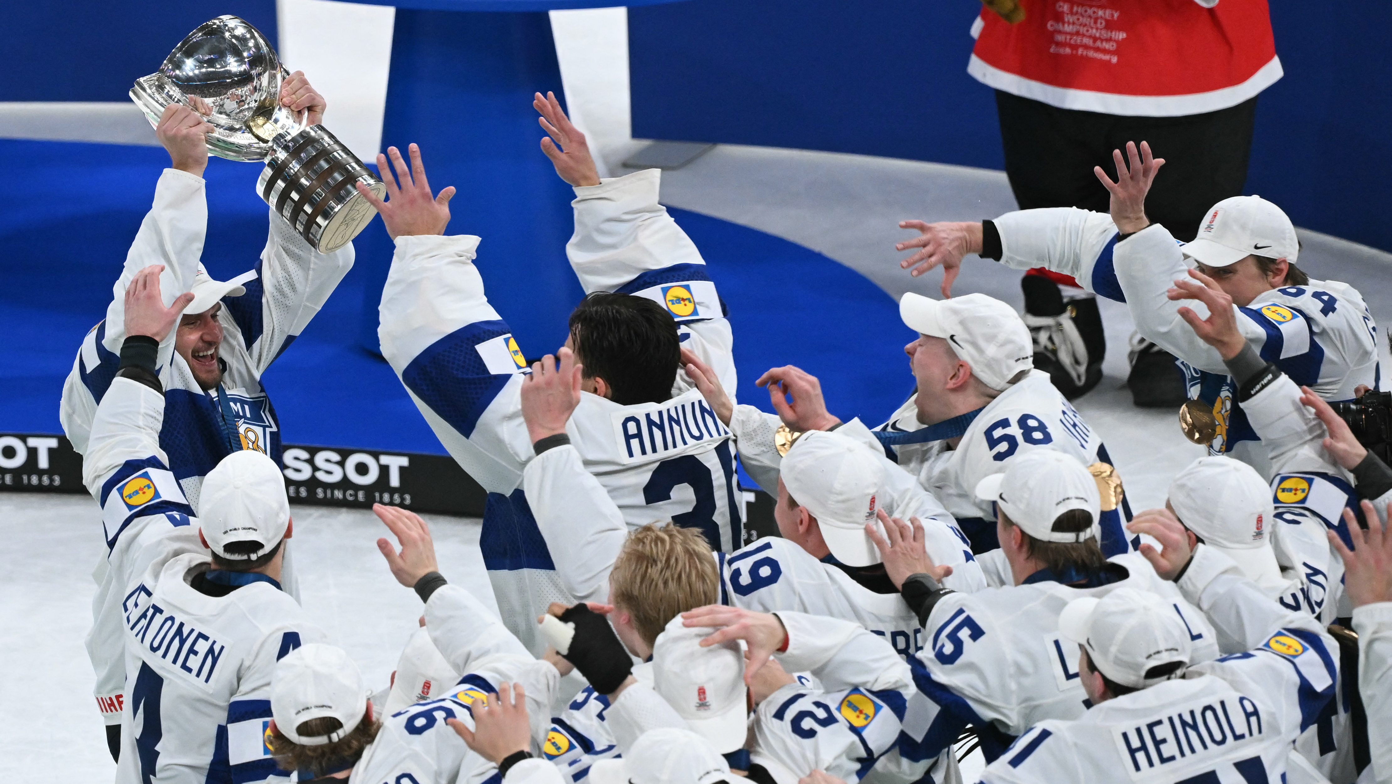 Finland beats Switzerland 1-0 in OT to win men's ice hockey world ...