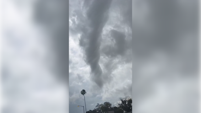 Funnel cloud forms near downtown Melbourne