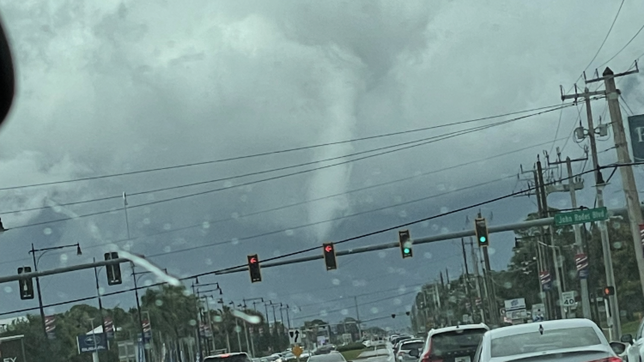 Tropical funnel cloud forms in Melbourne