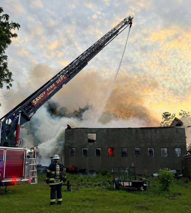 A dozen agencies respond to historic Homer barn fire