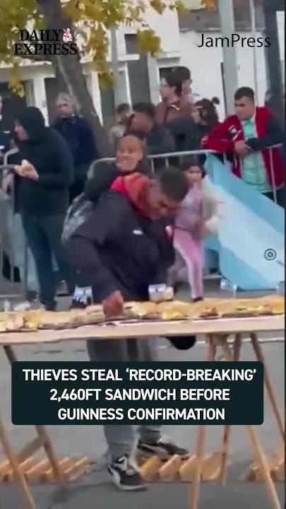 Spectators grab pieces of record-breaking sandwich before Guinness ...