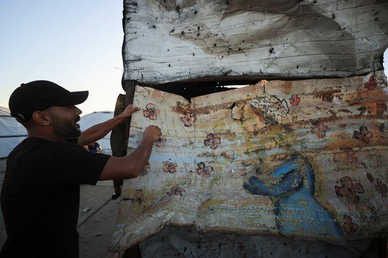 Israeli strike kills at least two at Gaza seaport cafe, medics say