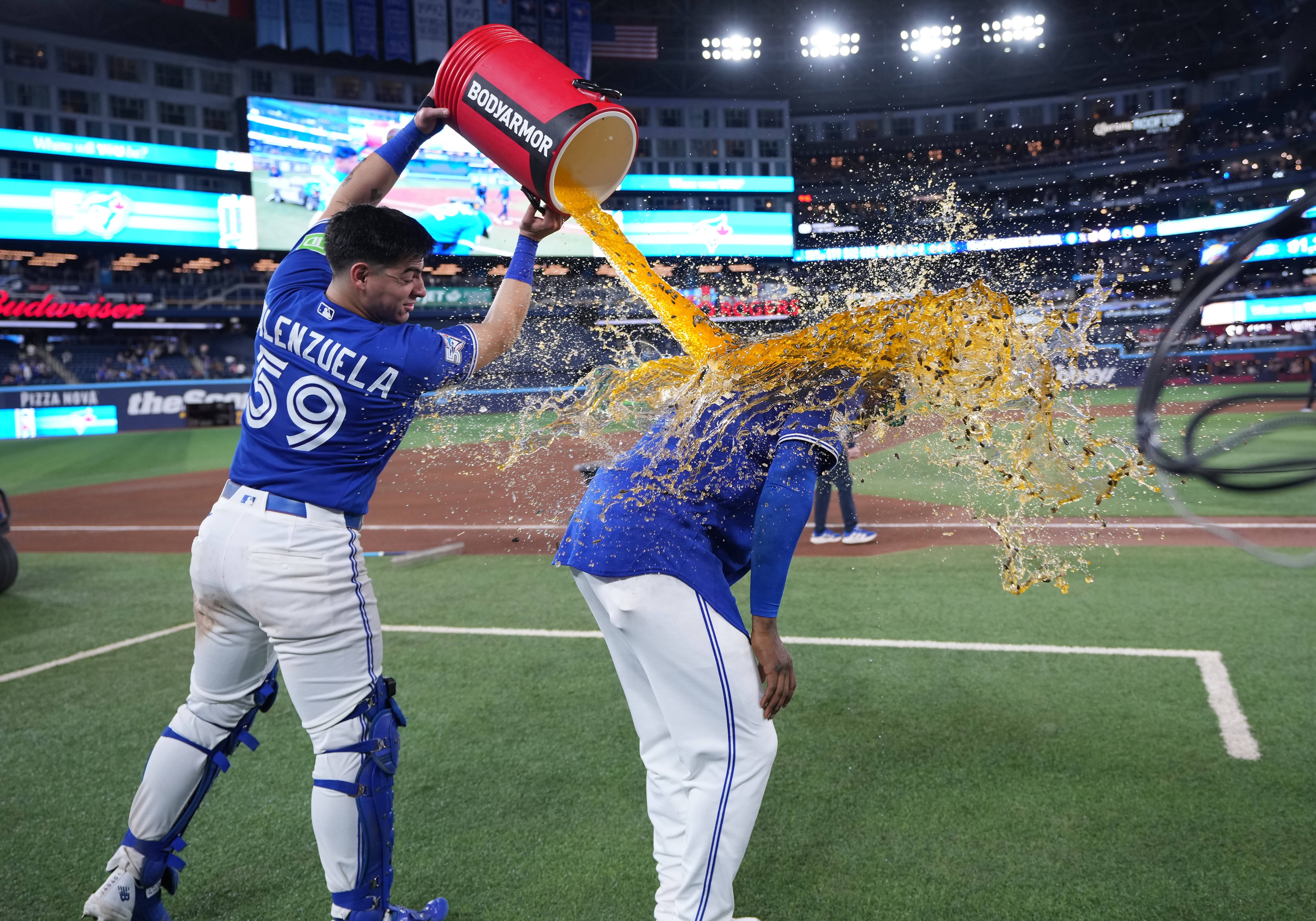 Blue Jays outfielder injured by baseball thrown by fan, leaves immediately