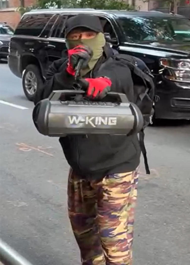 Masked weirdo with a microphone keeps vandalizing Polish consulate in ...