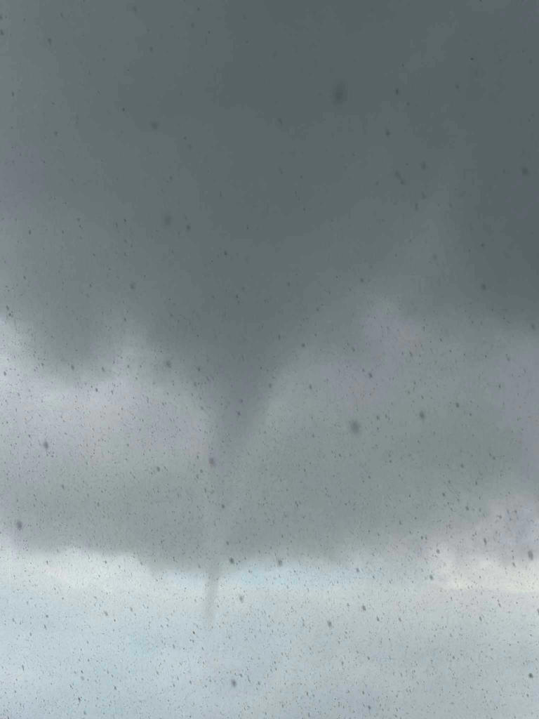 Funnel cloud forms near downtown Melbourne