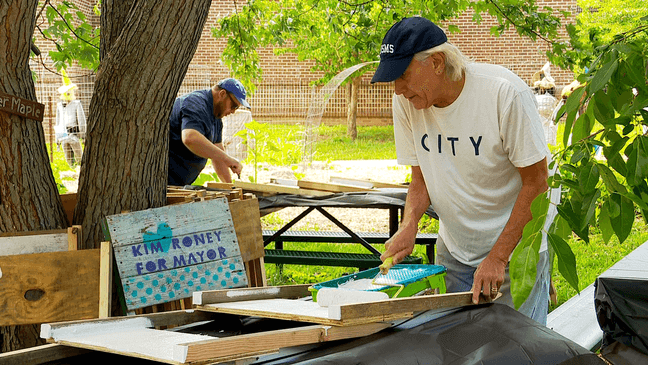 Mayoral candidate Kim Roney hosts pallet sign-painting to cut waste ...