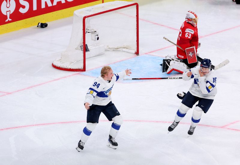 Ice hockey-Helenius is the hero as Finland beat Swiss in world final