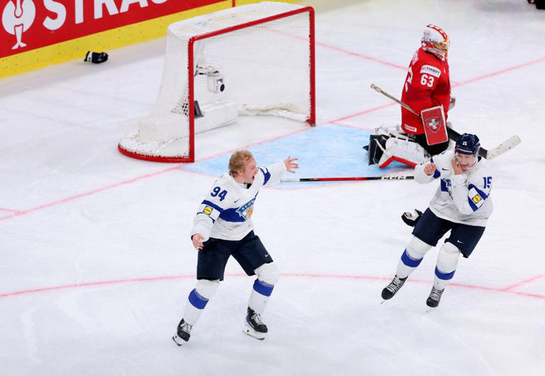 Ice hockey-Helenius is the hero as Finland beat Swiss in world final