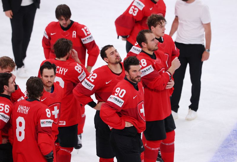 Ice hockey-Helenius is the hero as Finland beat Swiss in world final