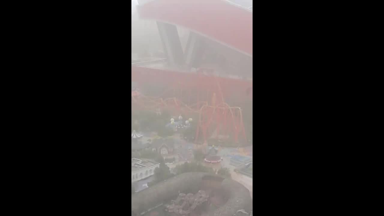 Roller coaster stalls mid-air during severe dust storm at Harbin ...