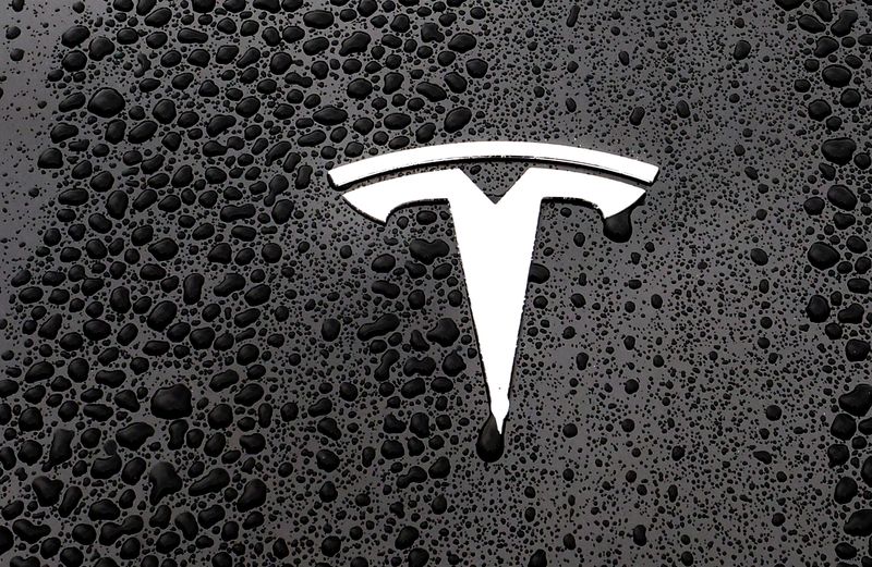 Tesla withdraws termination notice on graphite supply deal with ...